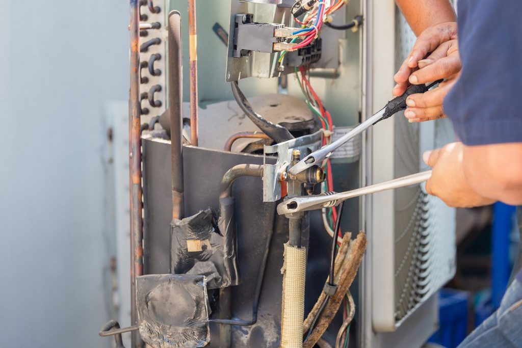 Air conditioning servicing